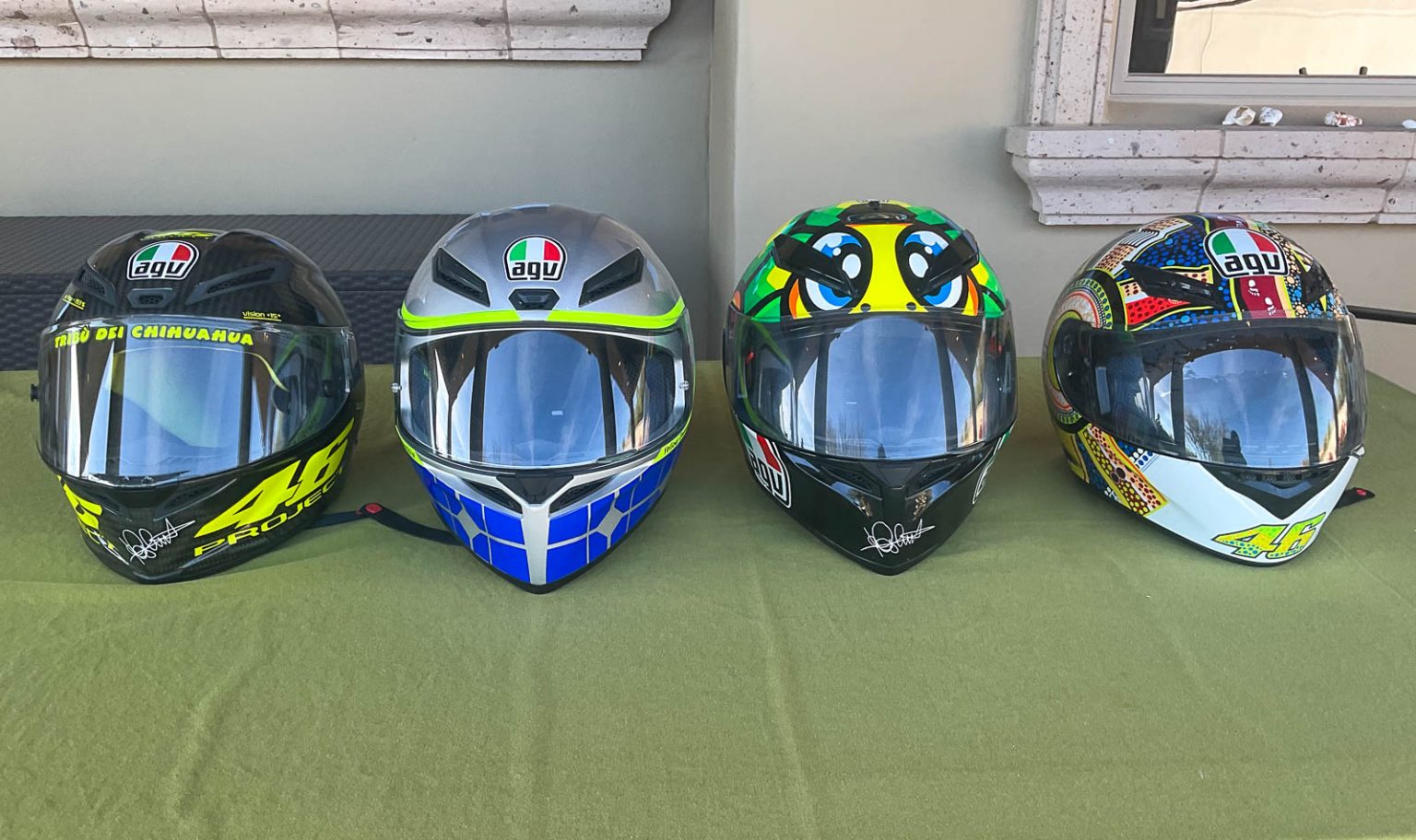 Collection of Four AGV Rossi Helmets – Iconic Motorbike Auctions